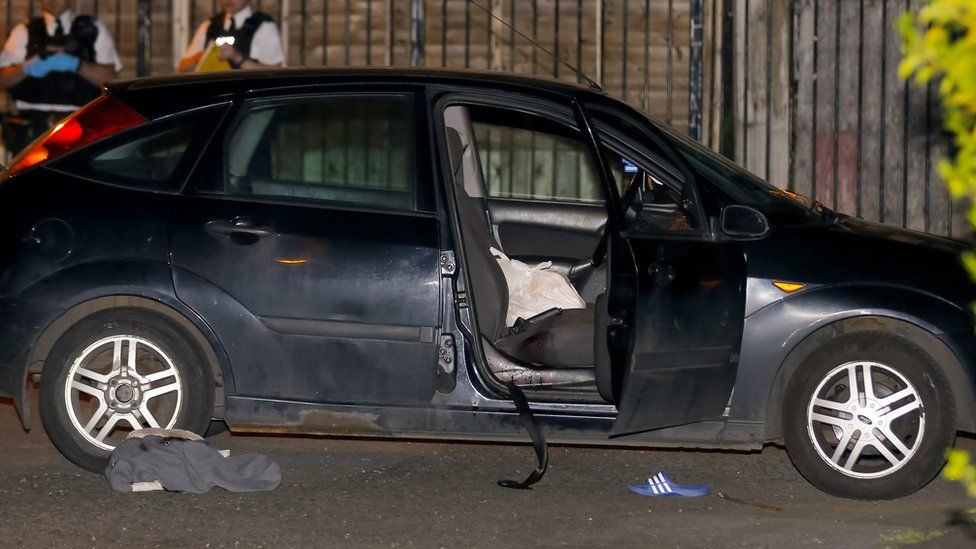 Dan Murray murder: Man, 53, arrested in gun attack investigation - BBC News