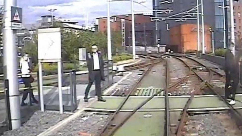 Metrolink tram in 'near-miss' as driver failed to stop - BBC News