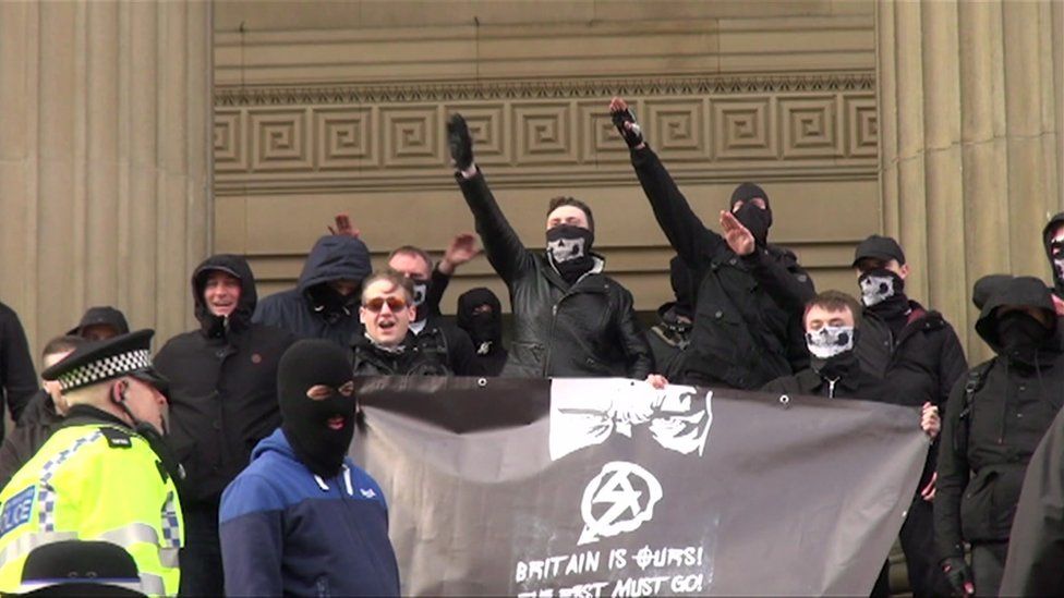 Arrests after North West Infidels and anti-fascist groups clash - BBC News