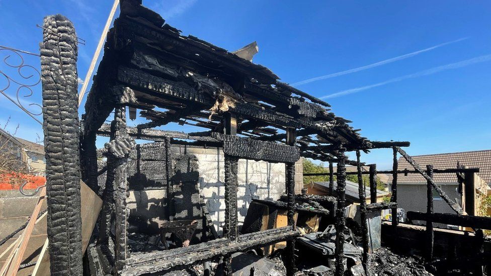 Cimla fire: Couple return from holiday to damaged home - BBC News