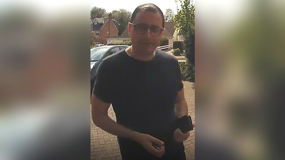 Warrant issued for fraudster after he fails to attend trial - BBC News