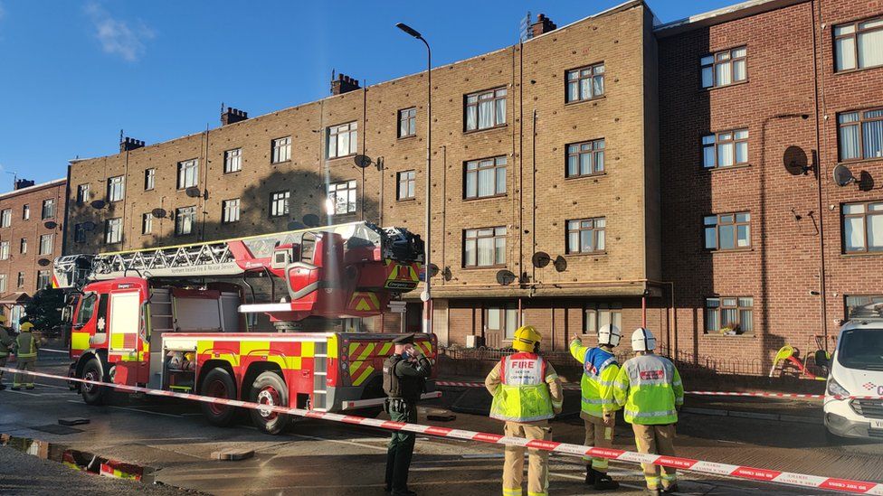 Rathcoole: Flats evacuated after 'partial collapse' of roof - BBC News