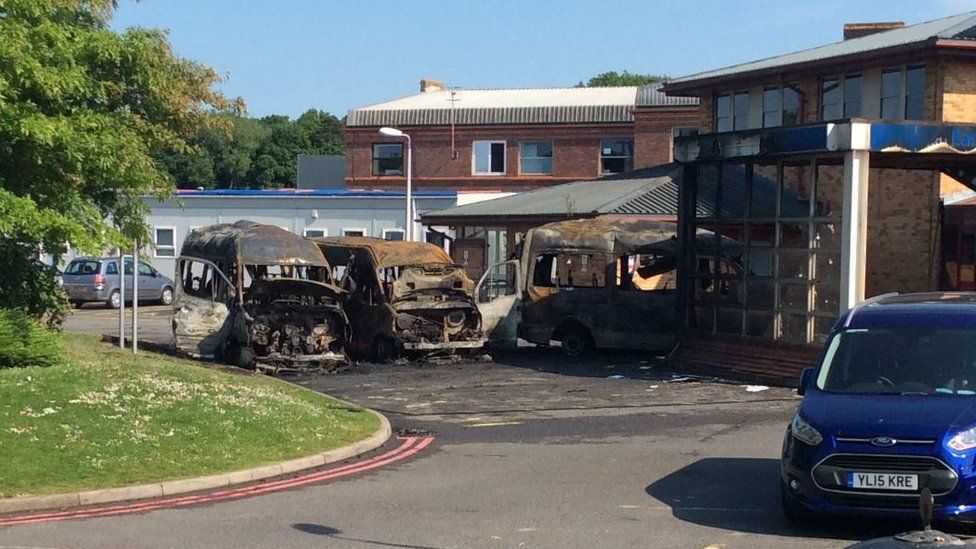 Fire destroys ambulances outside East Surrey Hospital - BBC News