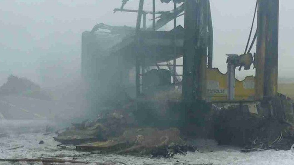 A303 lorry blaze leaves nails embedded in road surface - BBC News