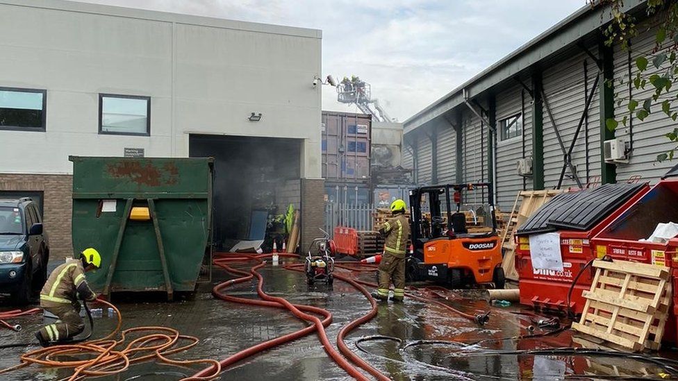 Witham industrial building blaze put out by 12 fire crews - BBC News