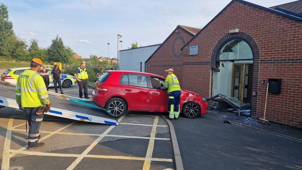 Hilton: Car crashes through front doors of village hall - BBC News