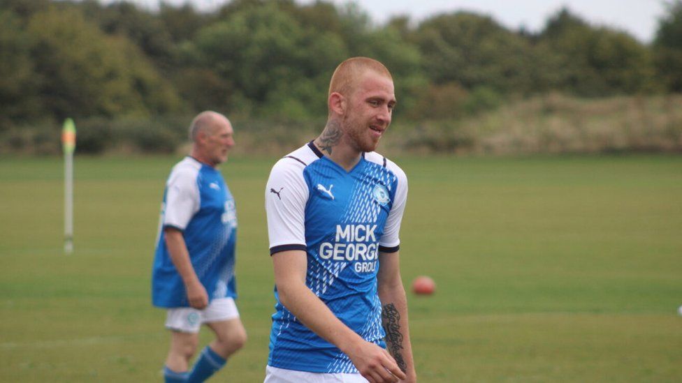 Peterborough charity 'empowering' the homeless with football - BBC News