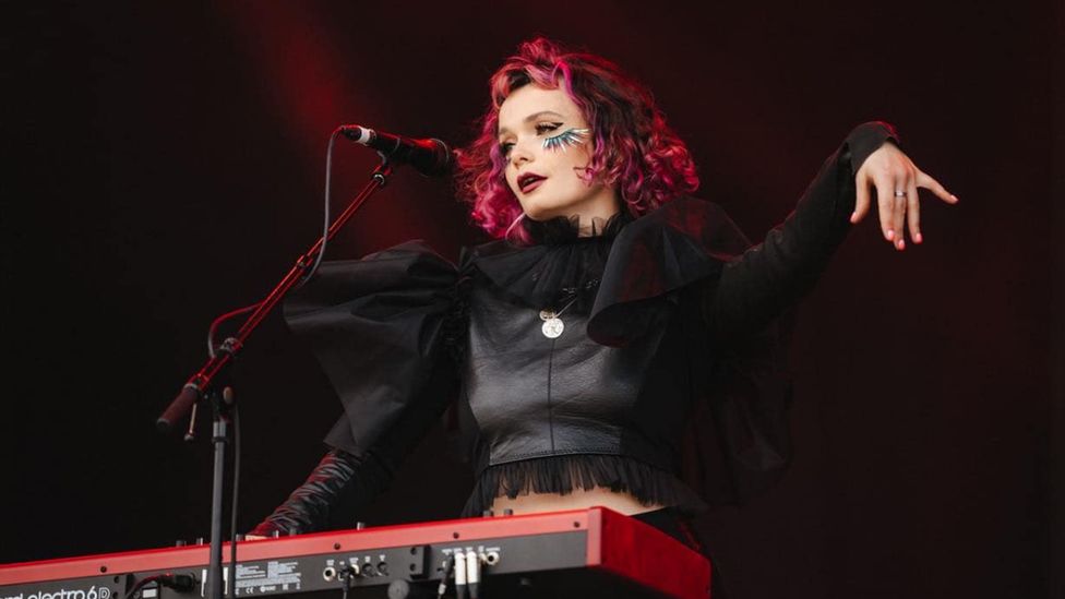 Glastonbury musician launched solo career after cancer - BBC News