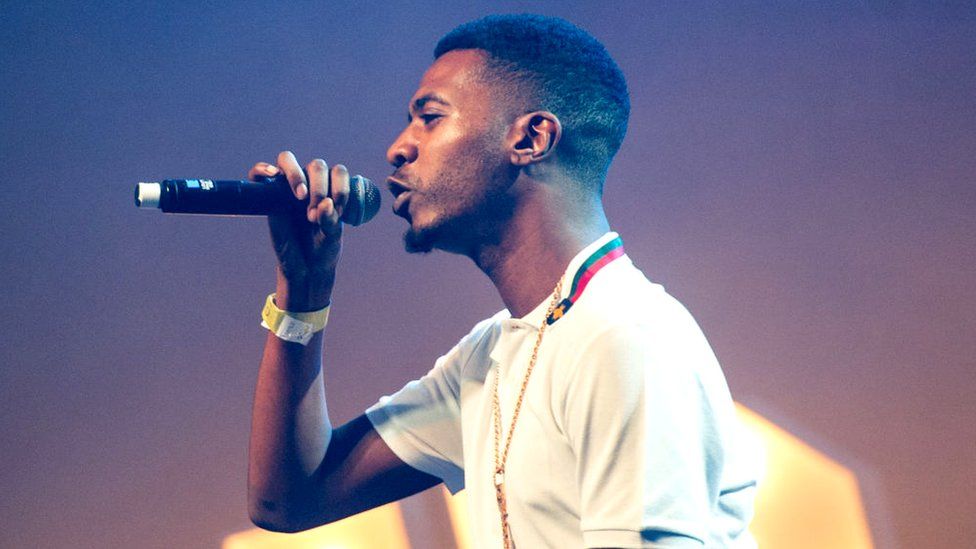 Rapper Nines charged with four drug-related offences - BBC News