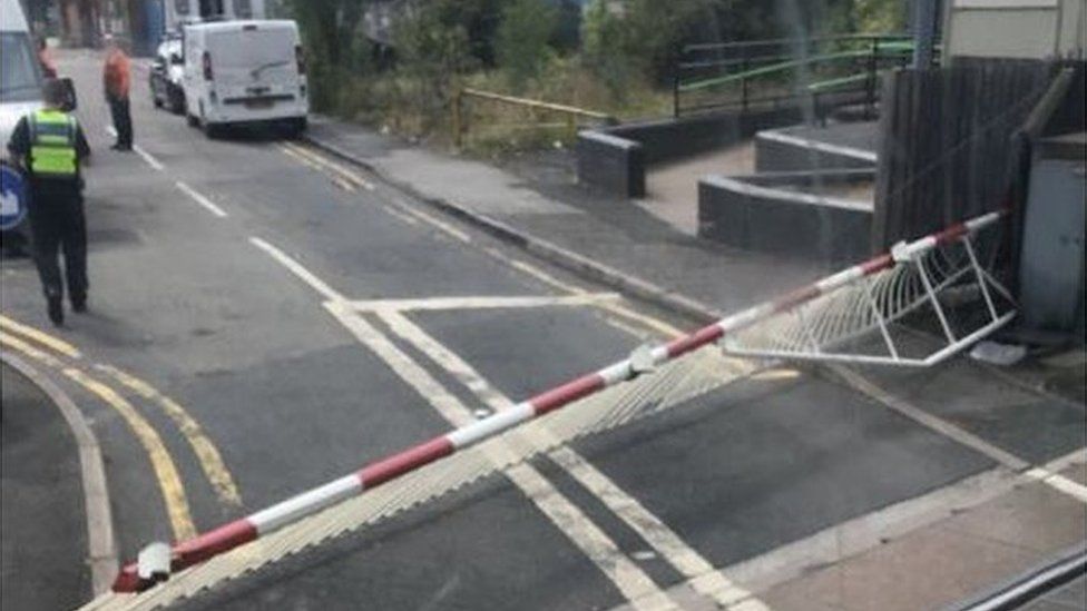 Level crossing crash disrupts train services - BBC News