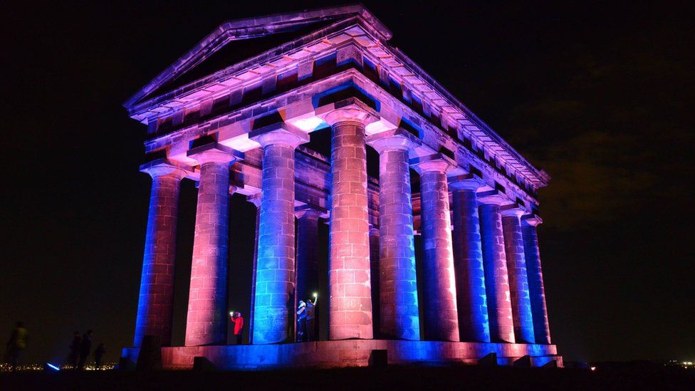 Sunderland landmarks lit up in honour of travel firm boss - BBC News