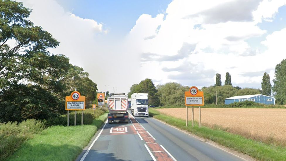 Man dies as car collides with horsebox on A17 - BBC News