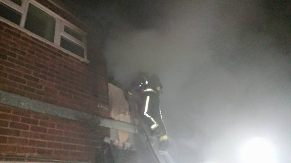 Woman and children rescued from Birmingham flat fire - BBC News