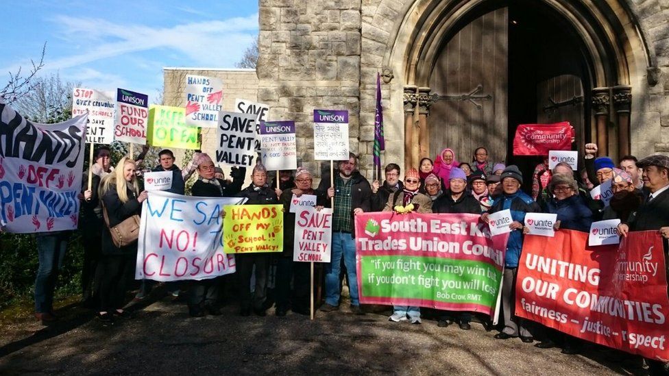 Anti-cuts demo outside Kent County Council budget talks - BBC News