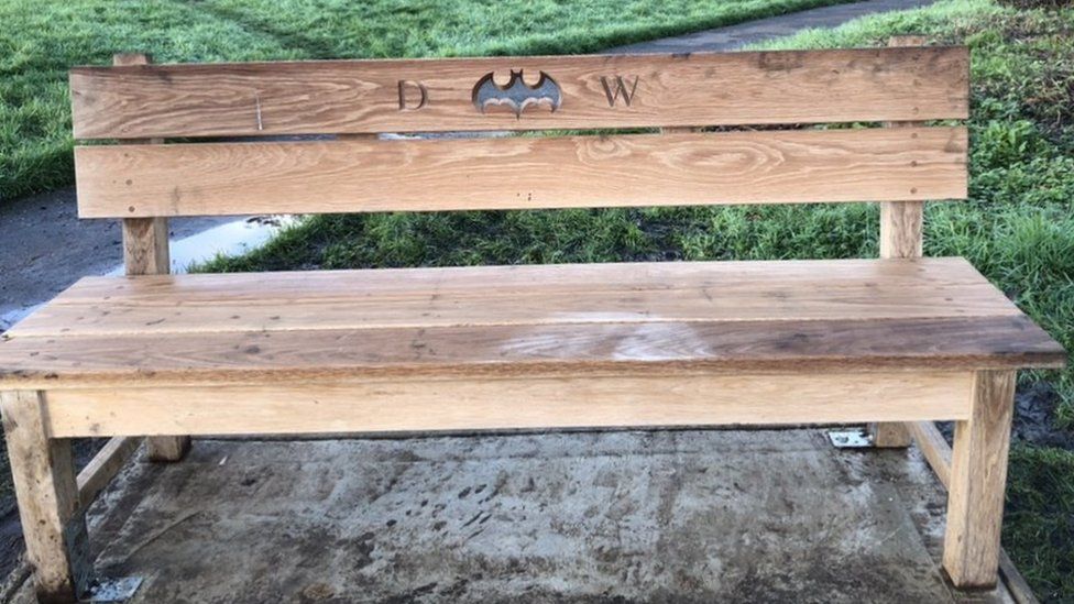 Godalming Batman park bench mystery finally explained - BBC News
