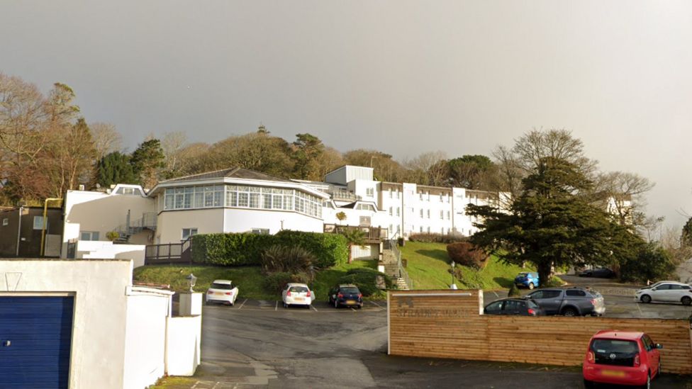 Asylum hotel: Protest against plans for Llanelli's Stradey Park - BBC News