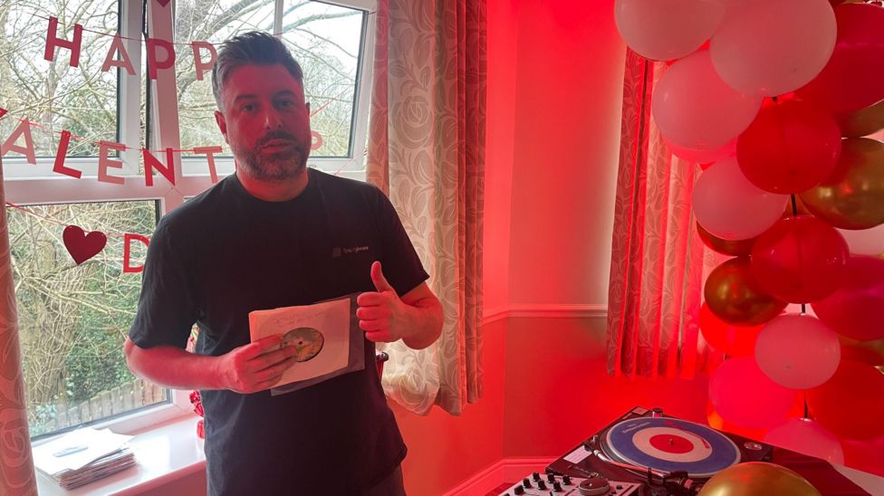 DJ spins the hits at care home Valentine disco - BBC News