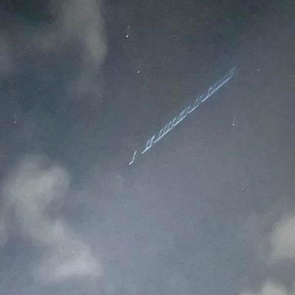 Elon Musk's Starlink satellites light up sky in south of England - BBC News
