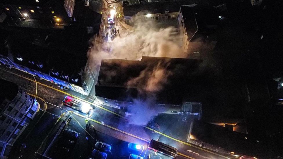 Fire crews battle blaze at old Hawick mill buildings - BBC News