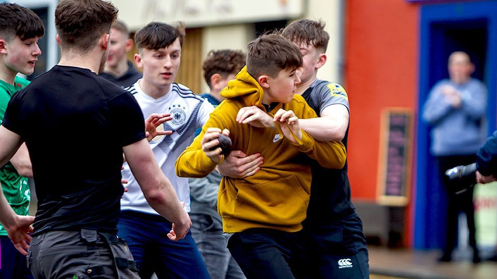 In pictures: Jedburgh ba' game takes to the streets - BBC News