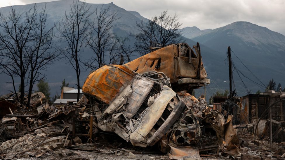 Jasper fire: Images show destruction from wildfire in Canada - BBC News