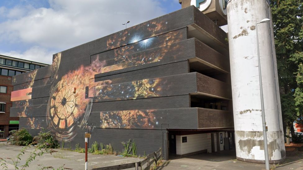 Coventry's largest mural being torn down in car park demolition - BBC News