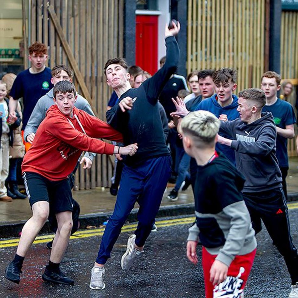 In pictures: Jedburgh ba' game takes to the streets - BBC News