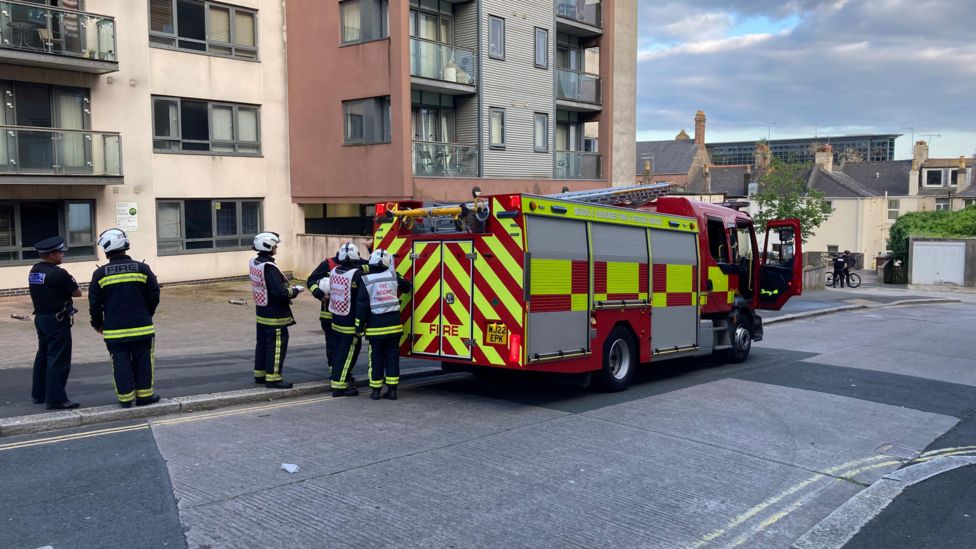 External cladding caught fire in Plymouth flats blaze - BBC News