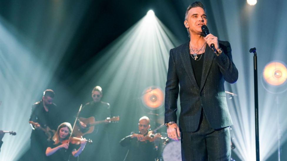 Robbie Williams at 50: 'He never liked birthday parties' - BBC News