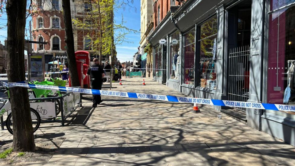 Woman arrested after broken glass attack in Nottingham - BBC News