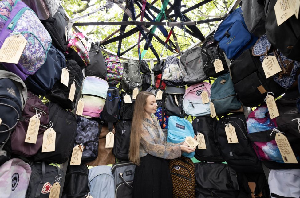 World Refugee Day: Backpack artwork unveiled - BBC News