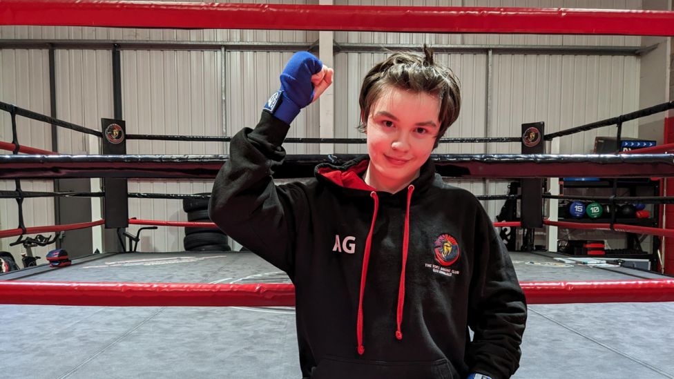 Boxing club transforms life for autistic boy - BBC News