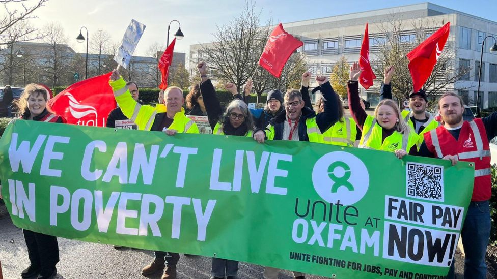 Oxfam workers suspend strike action after revised pay offer - BBC News