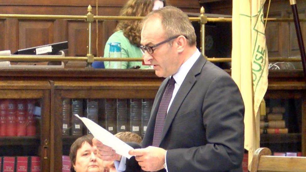 Chief Minister apologises for mistreatment of whistleblower - BBC News