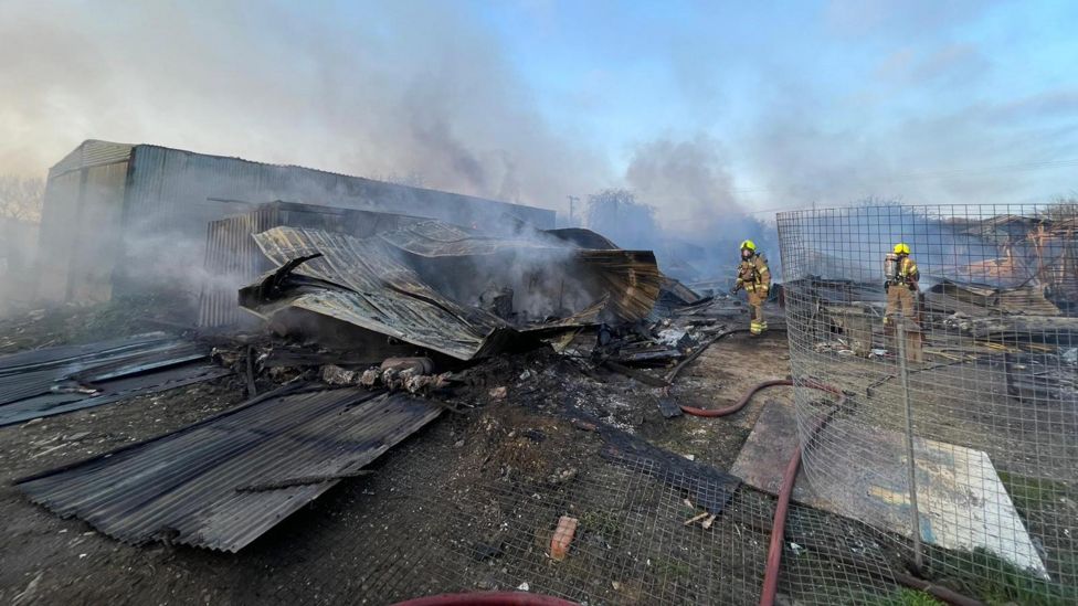 North Weald fire: Commercial buildings collapse - BBC News