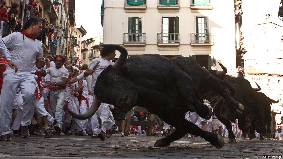 Pictures: Bull-running festival in Pamplona, Spain - BBC Newsround