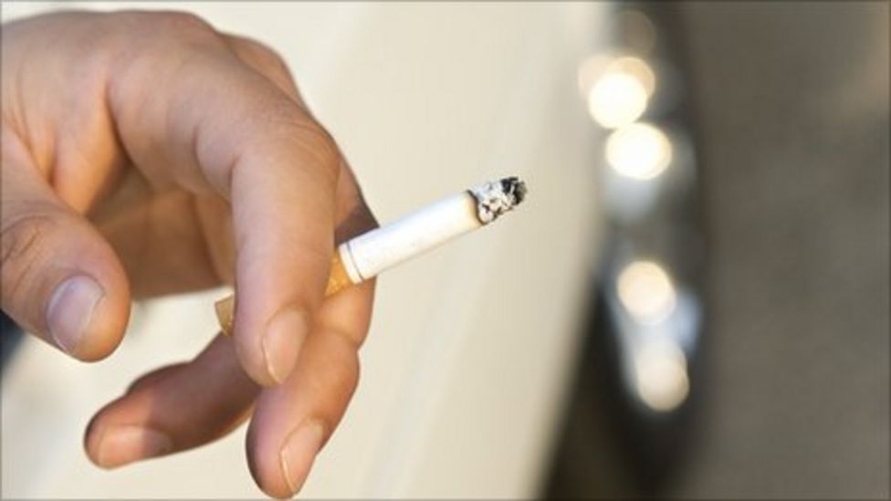 Car smoke ban 'to start in October' - BBC News