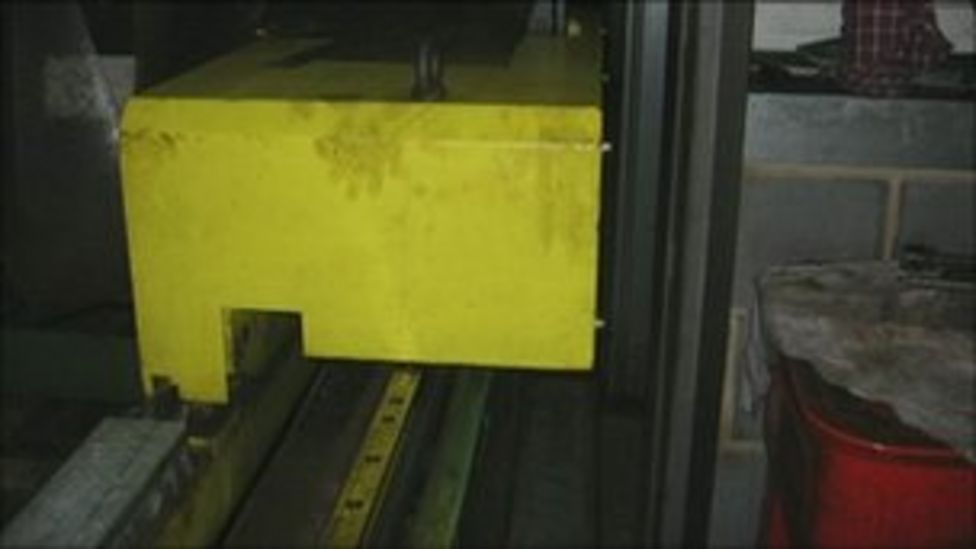 Companies fined after man dragged through machine - BBC News