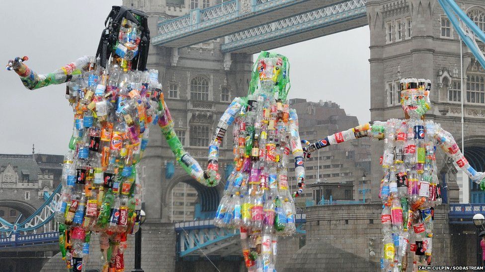 Pictures: Giant family made out of plastic bottles - BBC Newsround