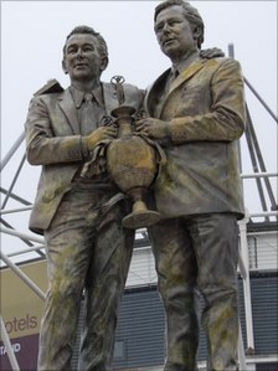 'Yellow' Brian Clough statue at Pride Park is repaired - BBC News
