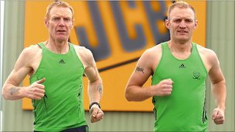 Guinness world record for father and son's marathon run - BBC News