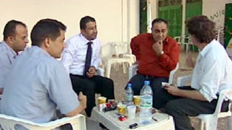 Muammar Gaddafi buried: End of gruesome show - BBC News