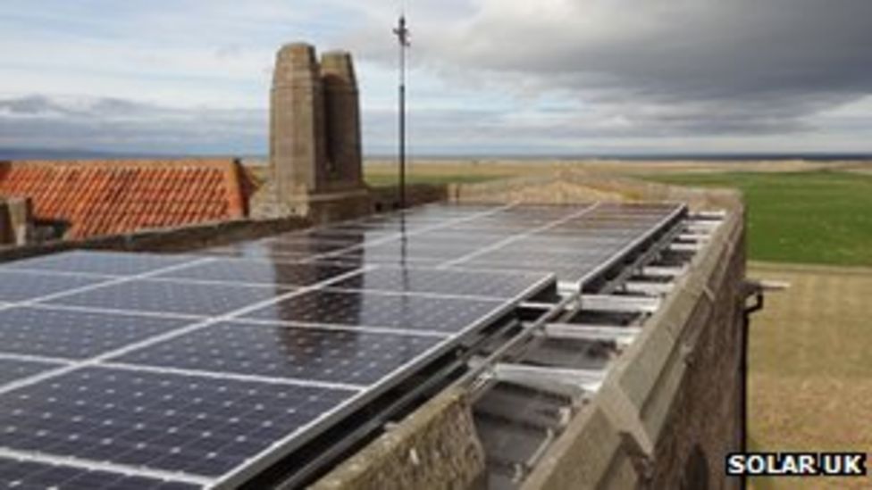 Solar panels are installed at Lindisfarne Castle - BBC News