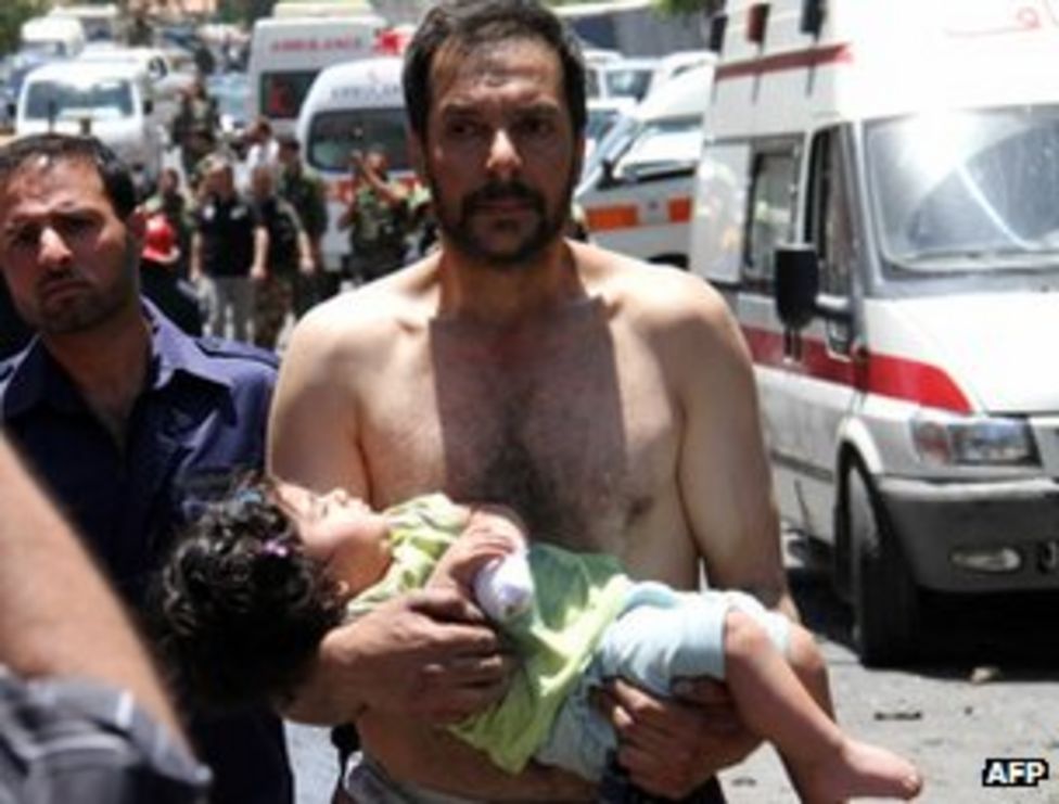 Syria Qubair: Bloody traces of massacre seen in village - BBC News