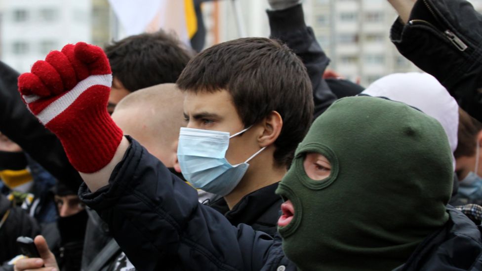 Russia nationalist leader jailed for life over hate crimes - BBC News