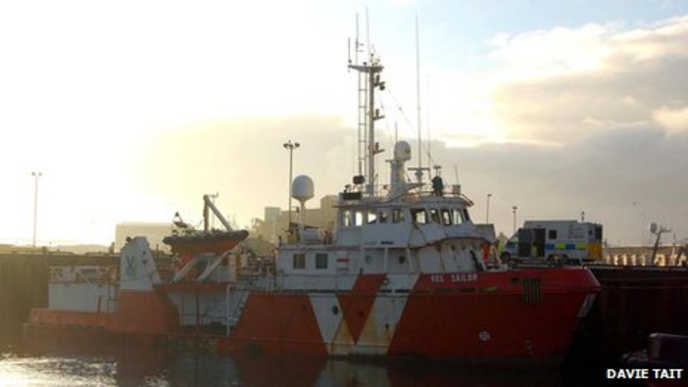 Vos Sailor: Crewman death vessel towed ashore with body - BBC News