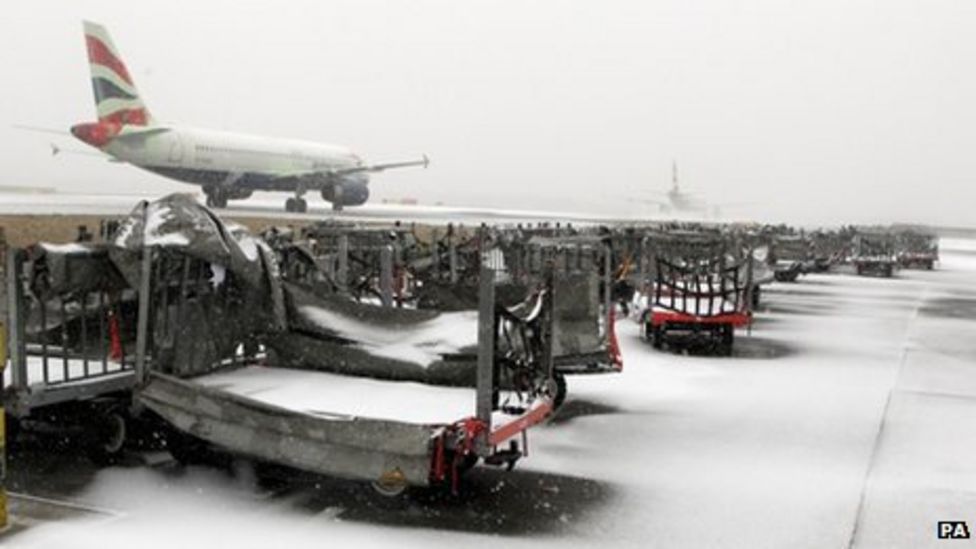 Heathrow cancels flights and transport is delayed by snow - BBC News