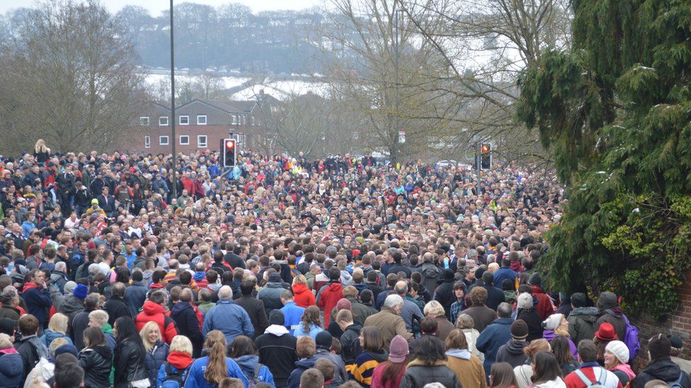 In pictures: Ashbourne's annual Shrovetide football game - BBC News