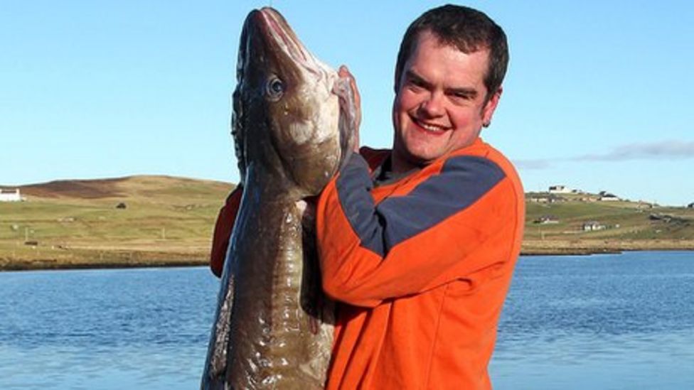 Grandfather lands 'biggest ever cod' in Scottish waters - BBC News