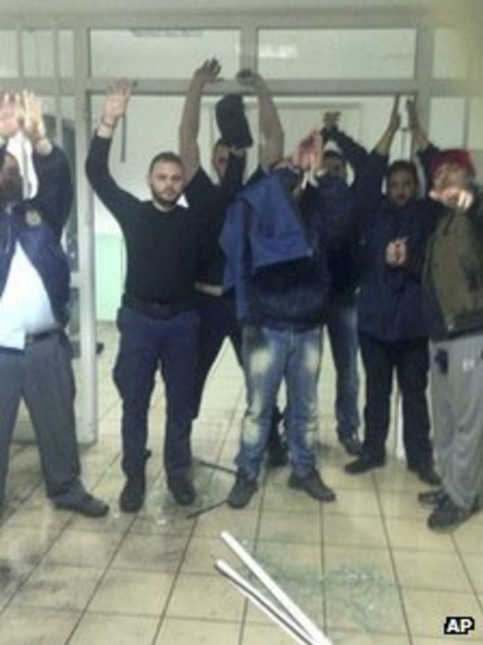 Greece prison siege ends with killer's surrender - BBC News